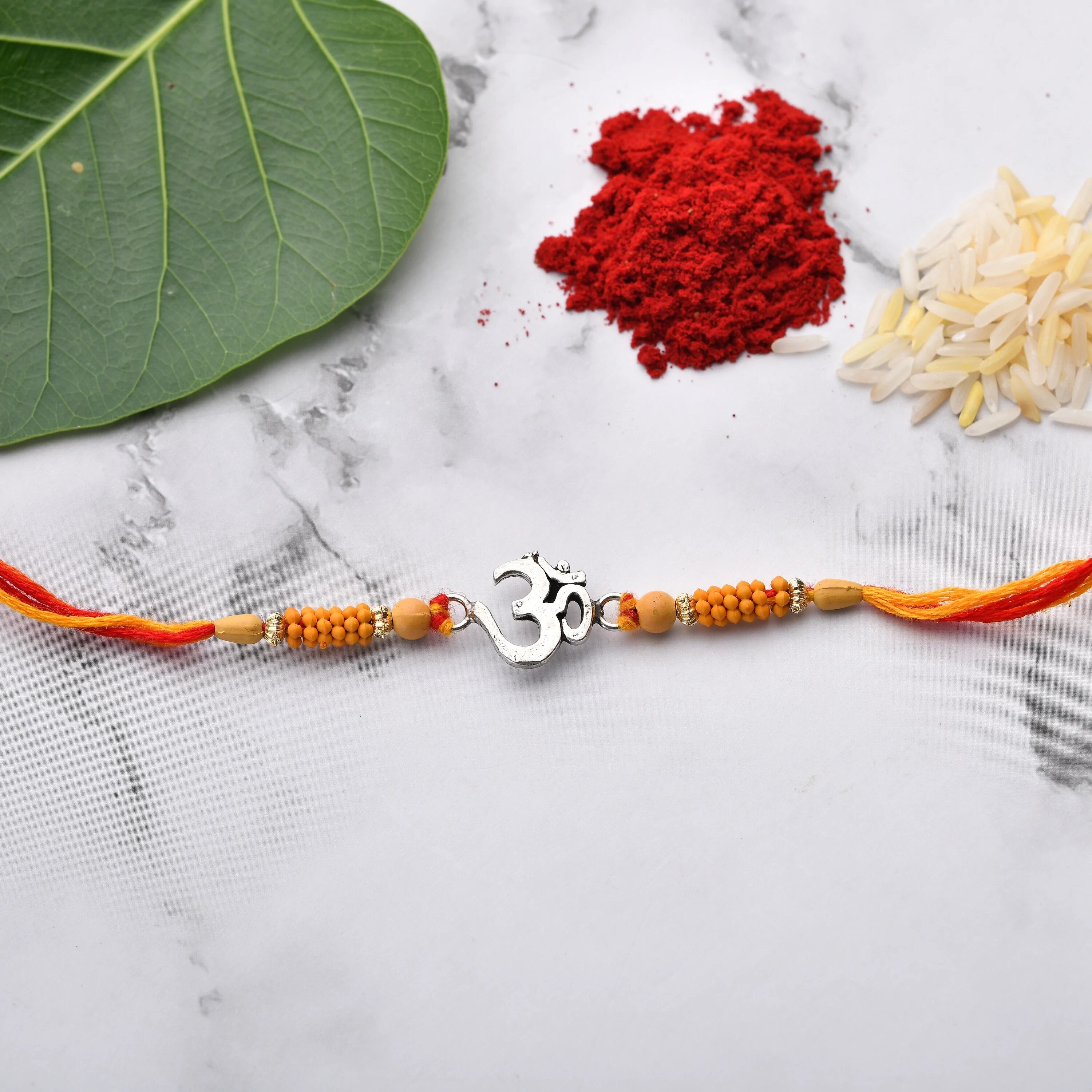 Silver OM Rakhi – VerveJewels